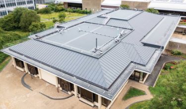 Single Ply Overlay To An Existing Metal Roof - Bauder
